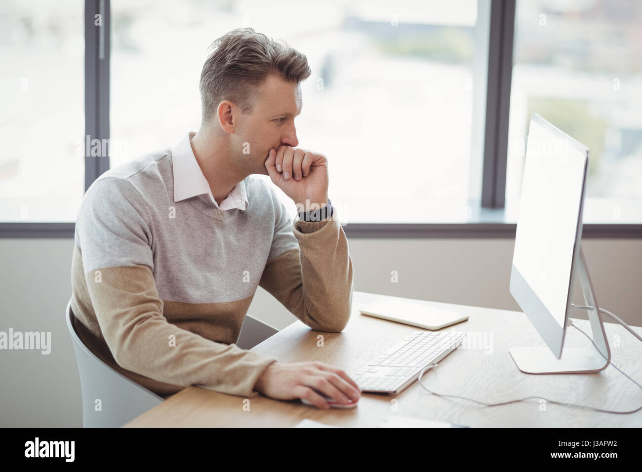 Attentive executive working personal hi-res stock photography and ...