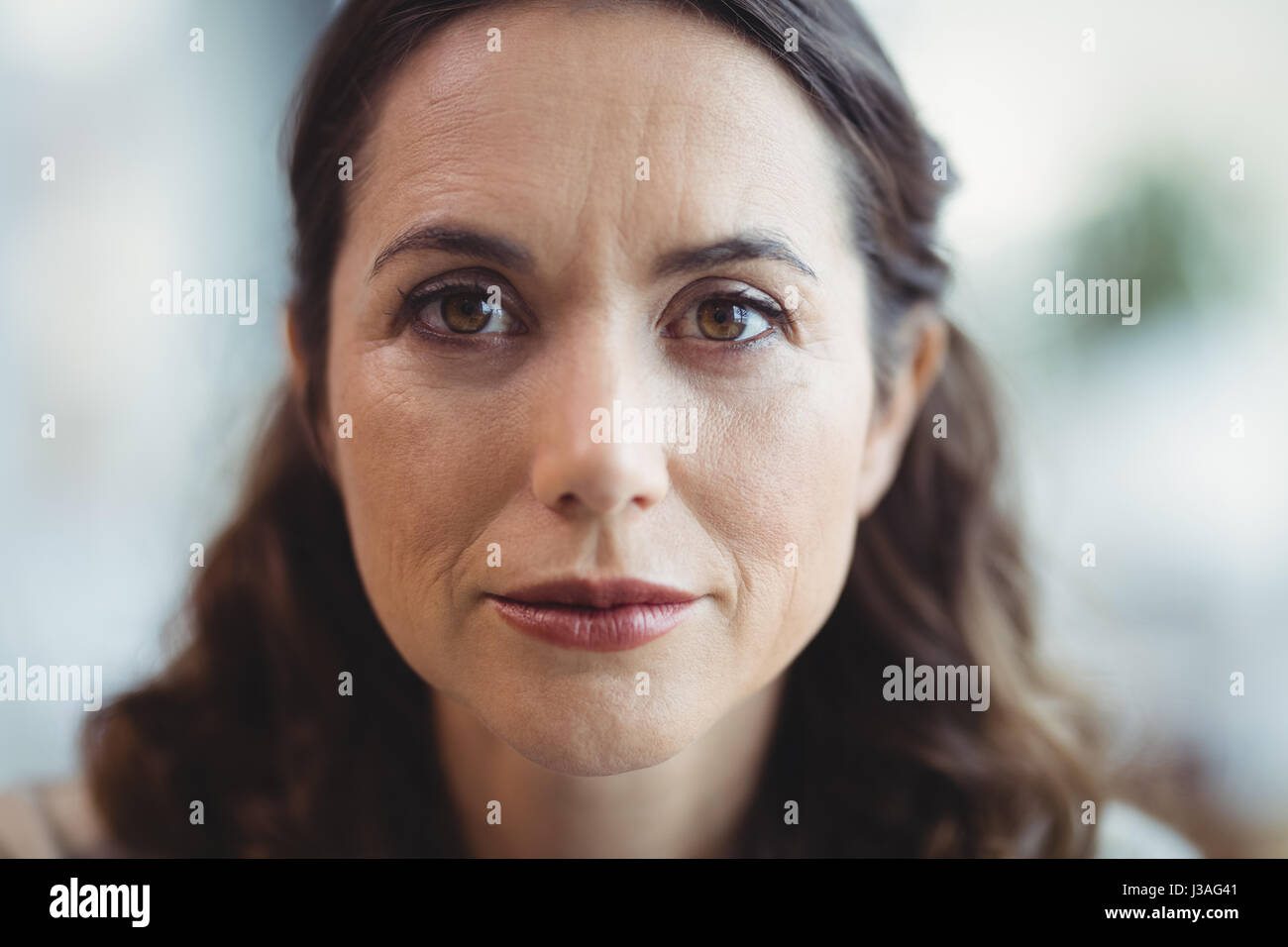 Close-up of executive in office Stock Photo - Alamy
