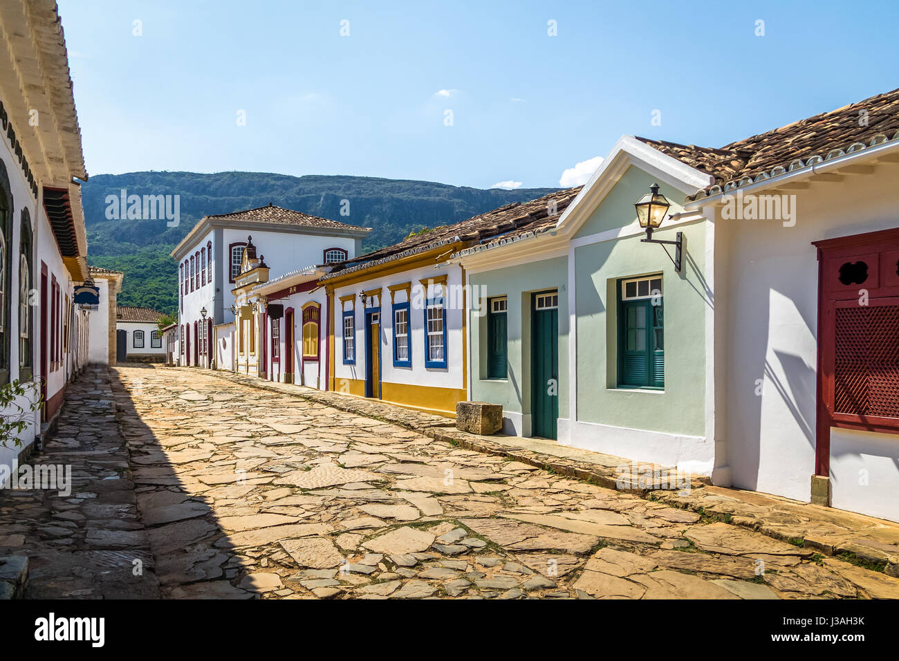 Colorful colonial houses and cobblestone street - Tiradentes, Minas ...
