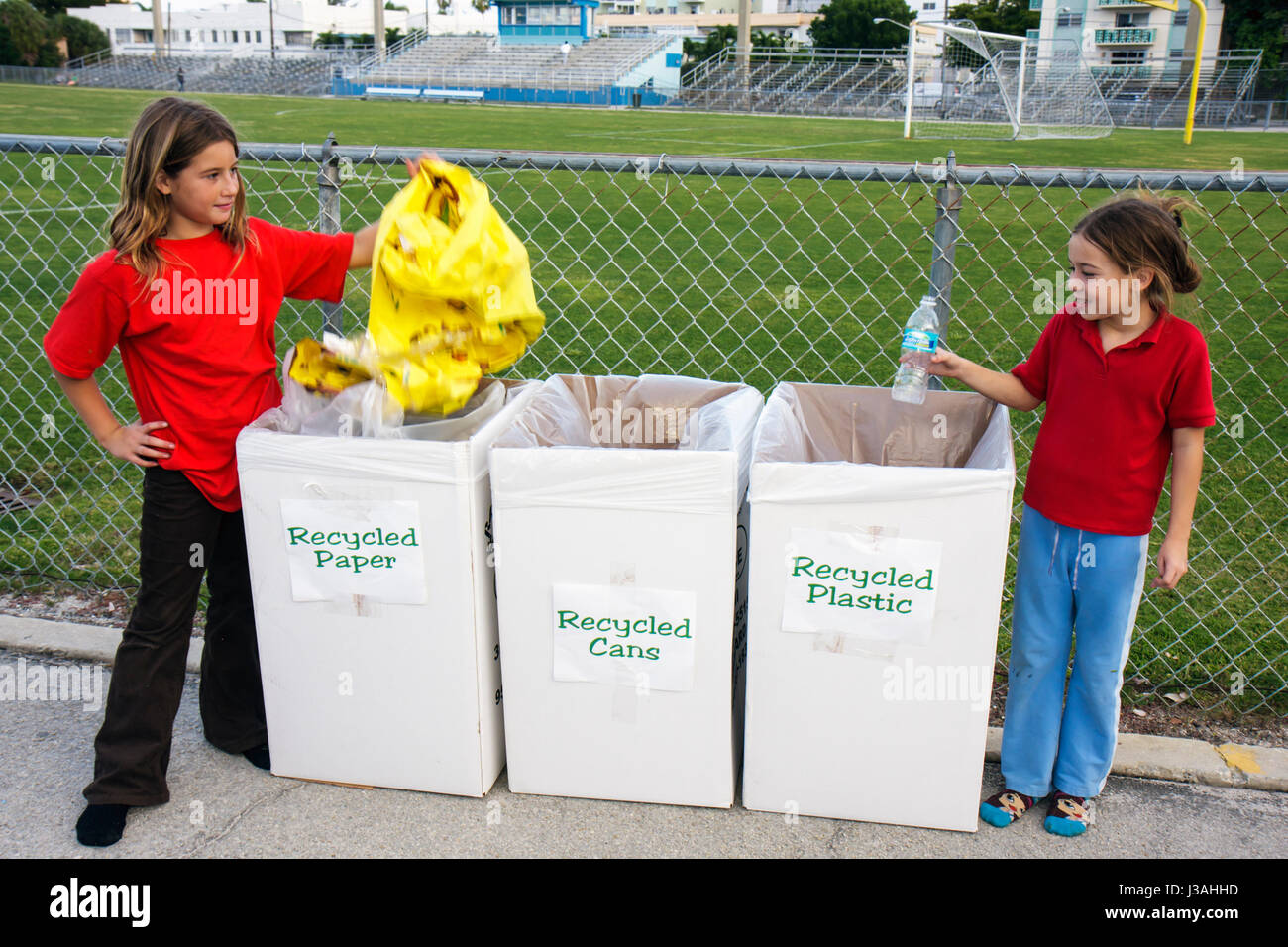 Miami Beach Florida,Flamingo Park,girls,two,recycle,recycling,paper ...