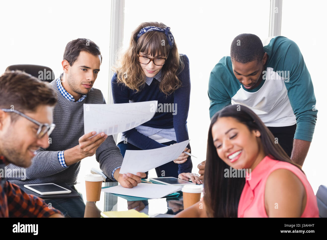 Business people working at desk in office Stock Photo - Alamy