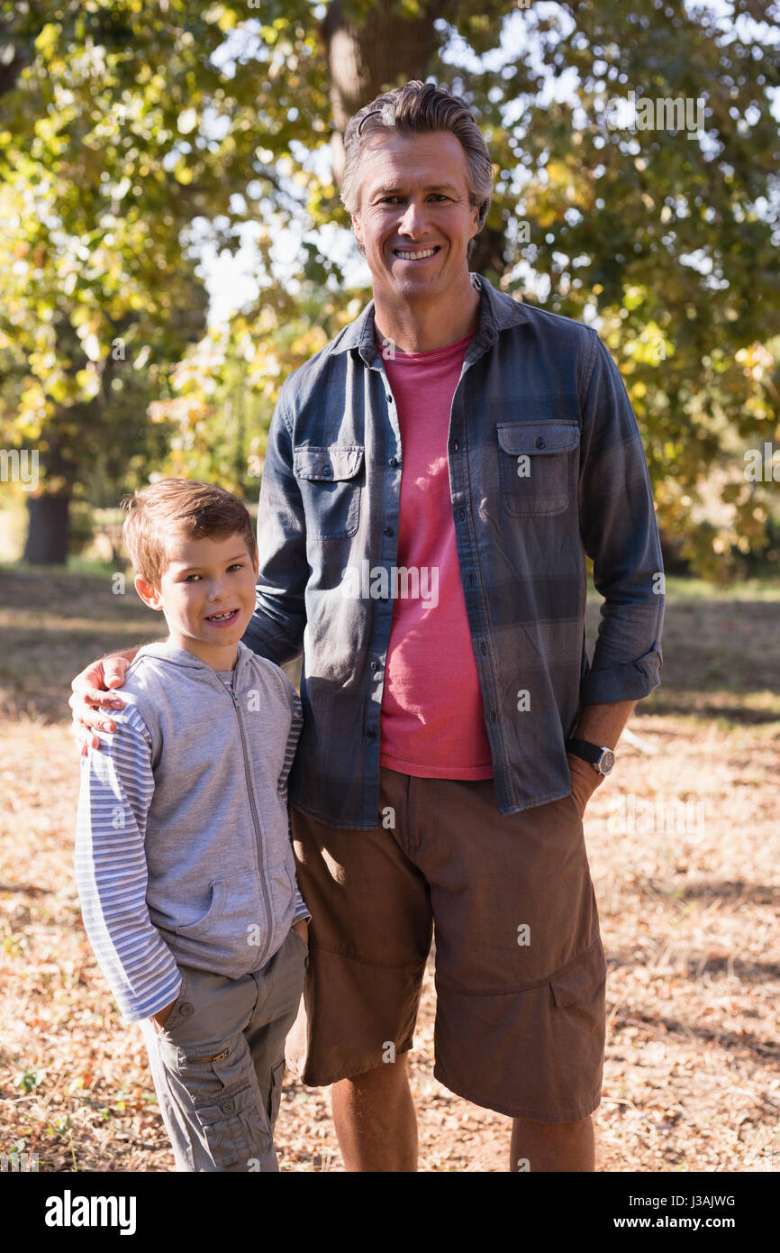 Boy standing in forest hi-res stock photography and images - Alamy