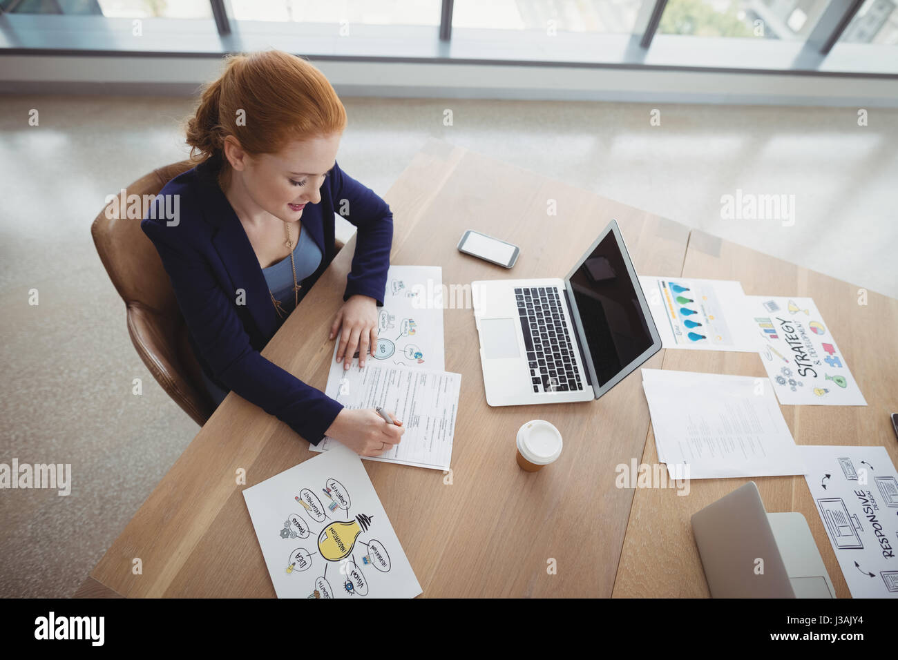 Overhead view focused woman hi-res stock photography and images - Alamy