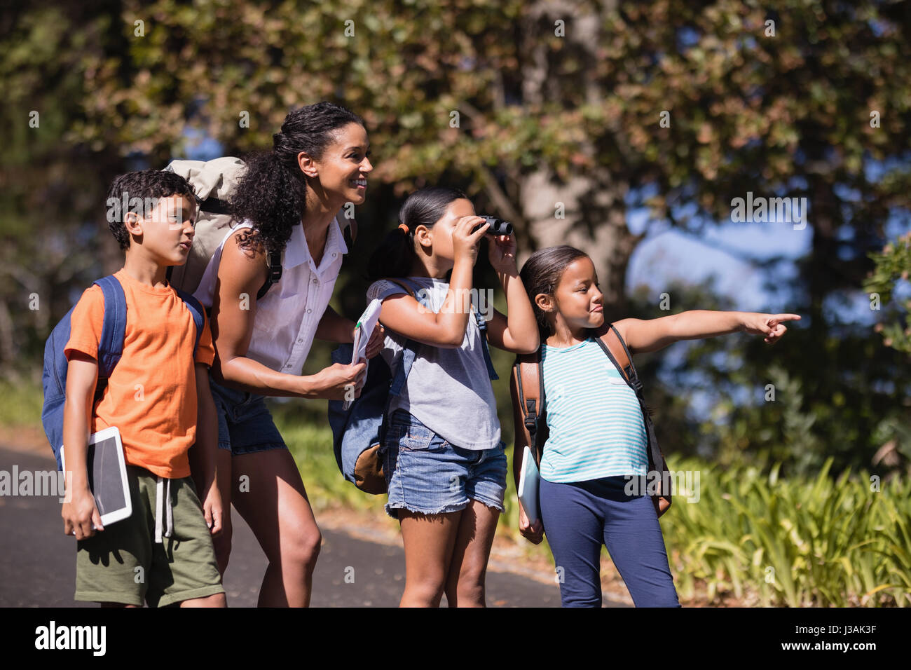 Pointing child and adult street hi-res stock photography and images - Alamy