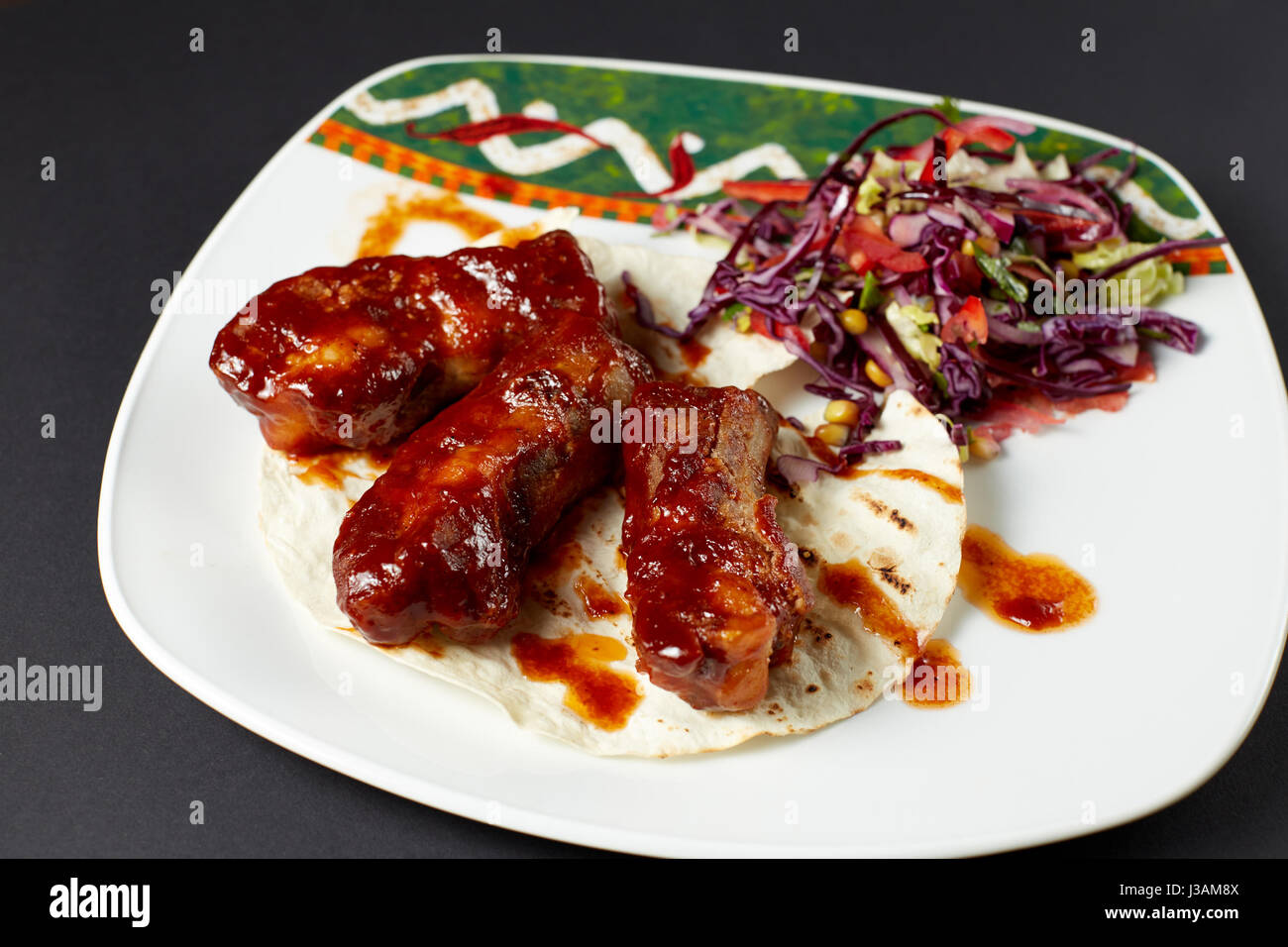 Pork ribs in Mexican style. Mexican food. Mexican cuisine. Studio shot ...