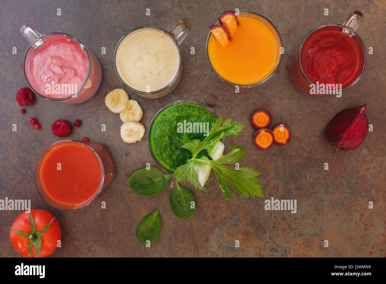 Freshly prepared fruit and vegetable smoothies. Top view, blank space ...