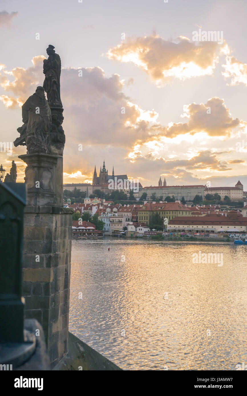 The impressive view of Prague Castle, from Charles Bridge at sunset ...