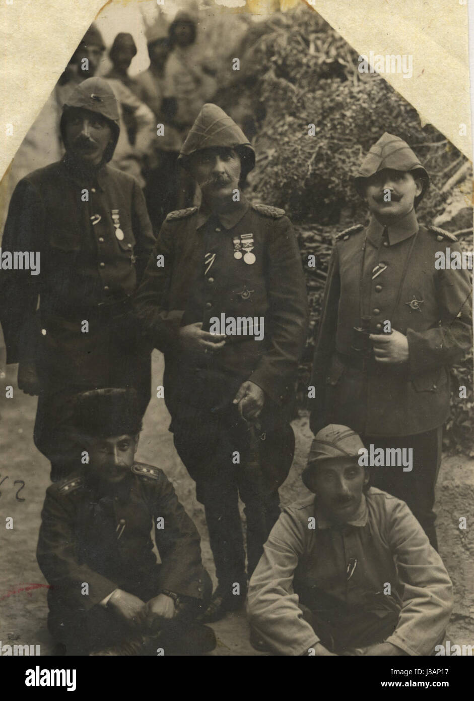 Esad Pasha, an Ottoman general, is depicted here with his staff ...