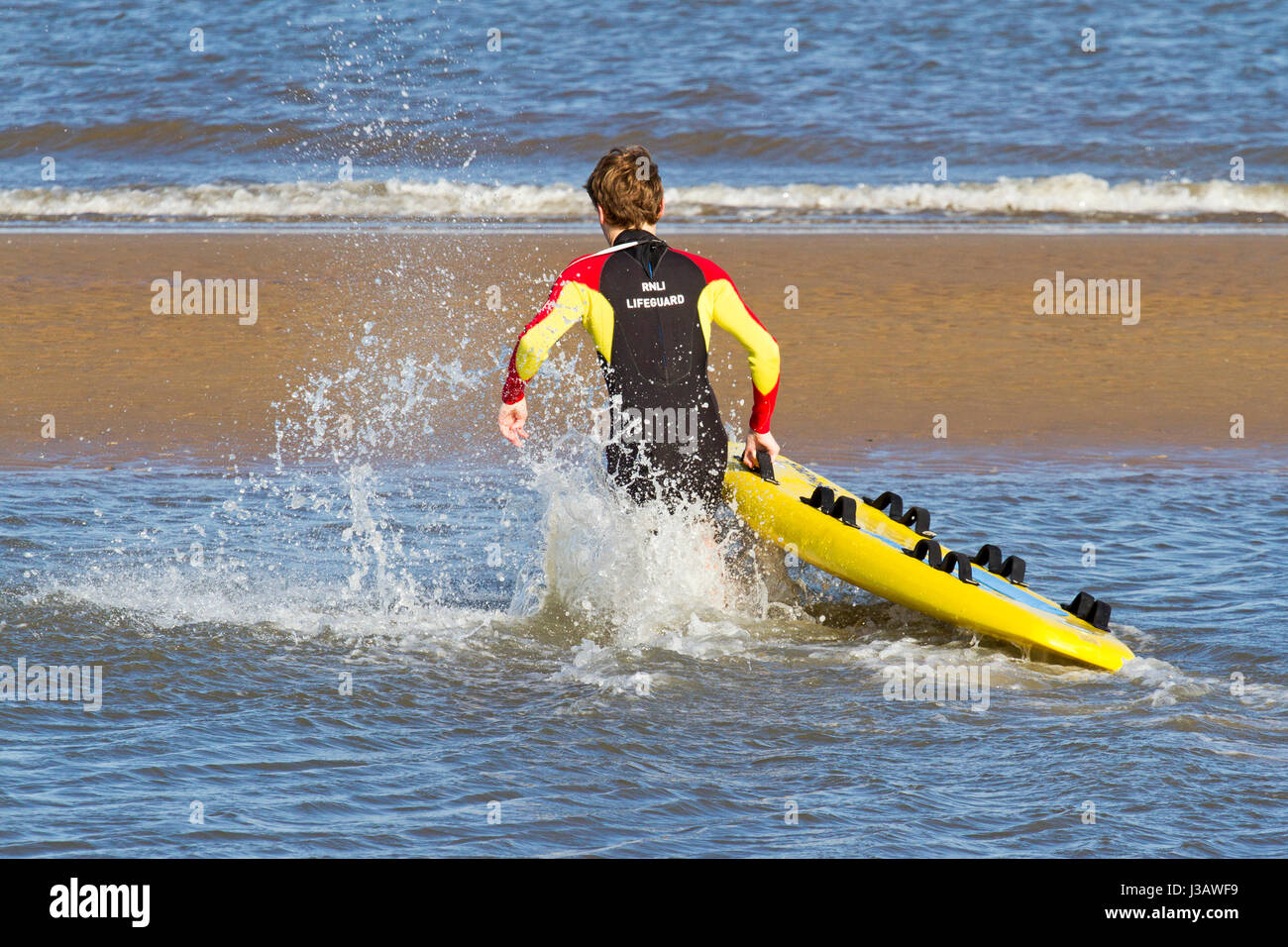 rnli lifeguard sea save rescue rescuer emergency drown drowning water ...