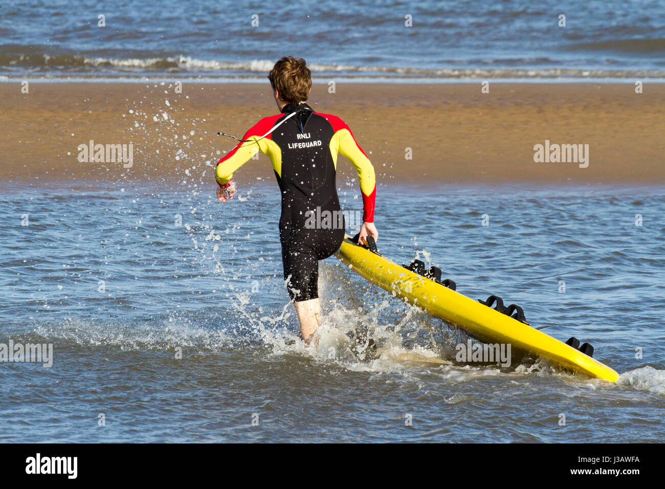 rnli lifeguard sea save rescue rescuer emergency drown drowning water ...
