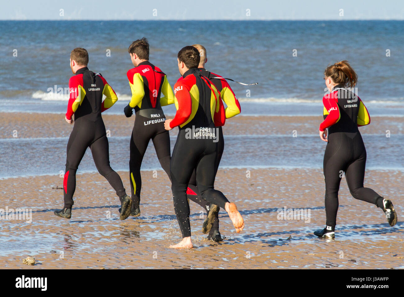rnli lifeguard sea save rescue rescuer emergency drown drowning water ...