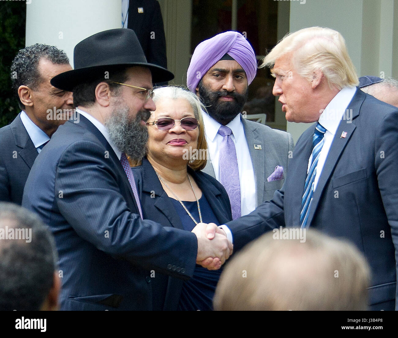 United States President Donald J. Trump shakes hands with Rabbi Levi ...