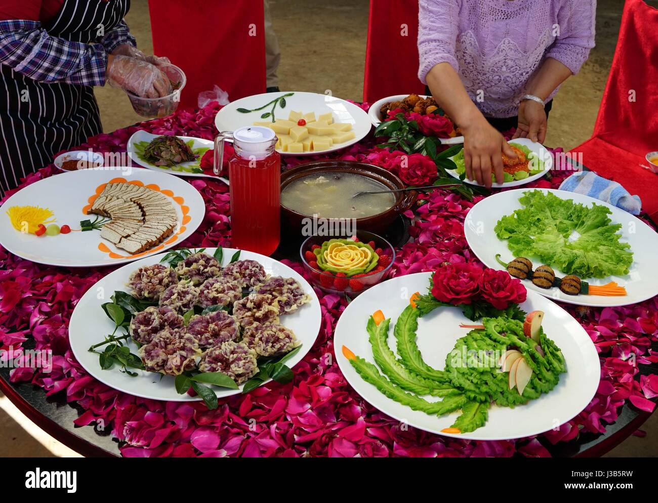 Kunming, China's Yunnan Province. 5th May, 2017. Villagers prepare ...