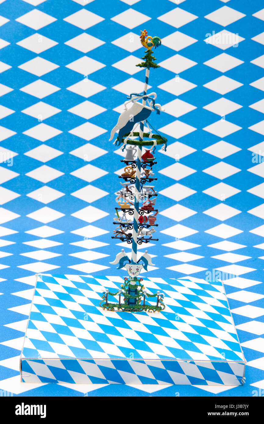 Munich, Germany. 05th May, 2017. A miniature maypole made out of tin ...