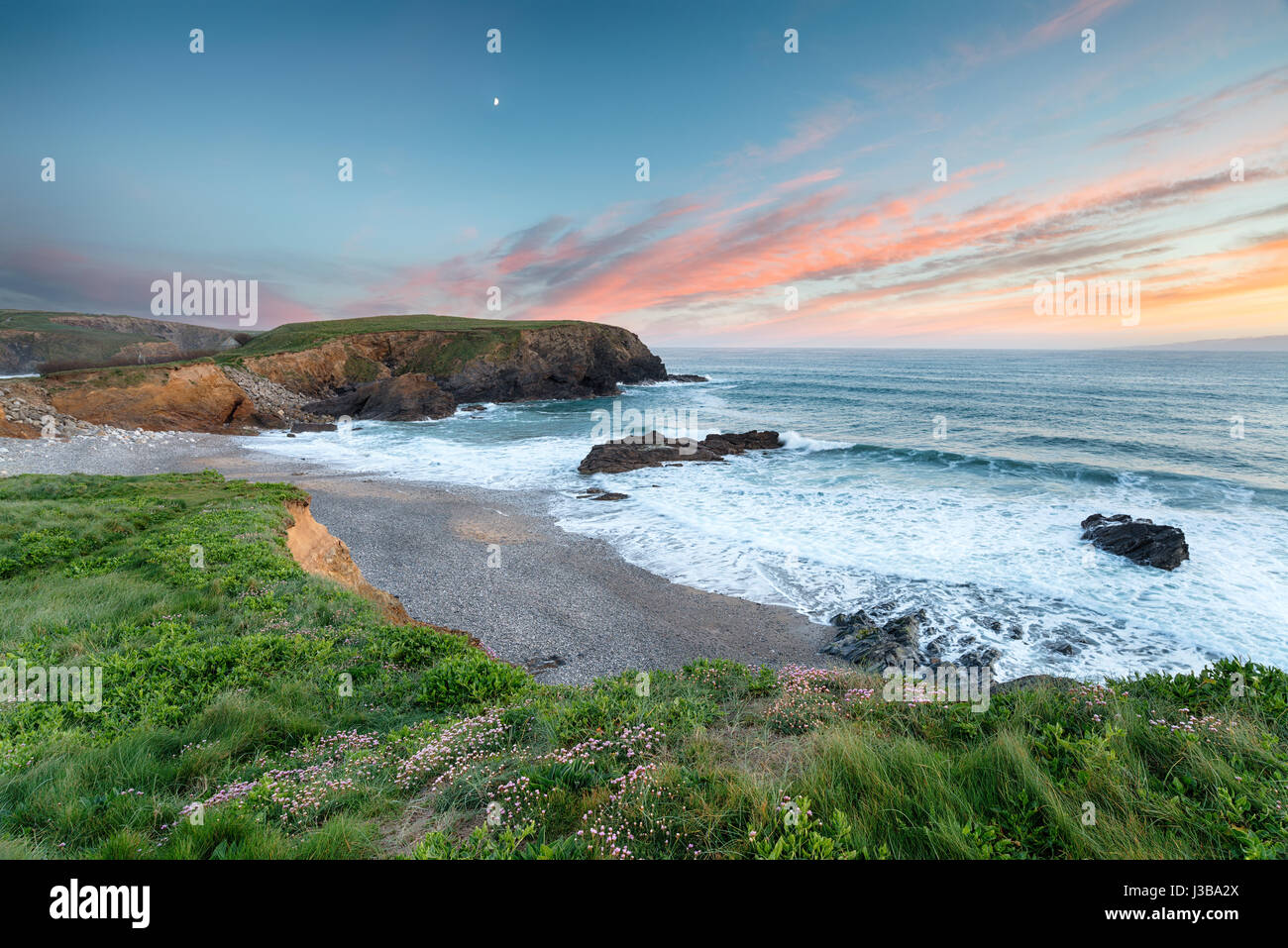 Dusk over Church Cove at Gunwalloe on the Cornwall coast Stock Photo ...