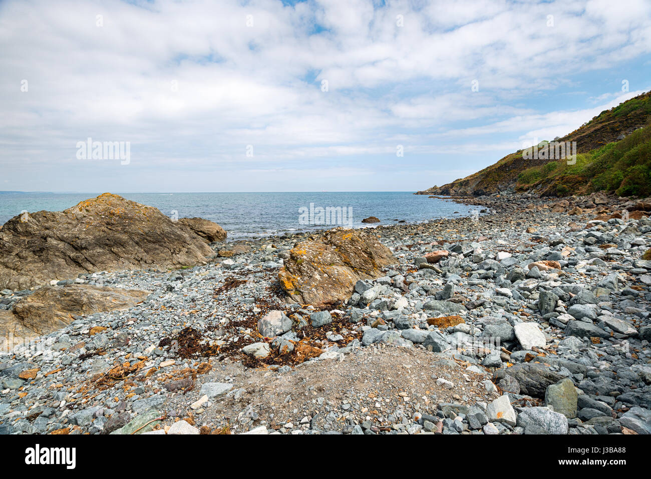The rocky beach at Porthallow Cove on the Lizard Peninsula in Cornwall ...