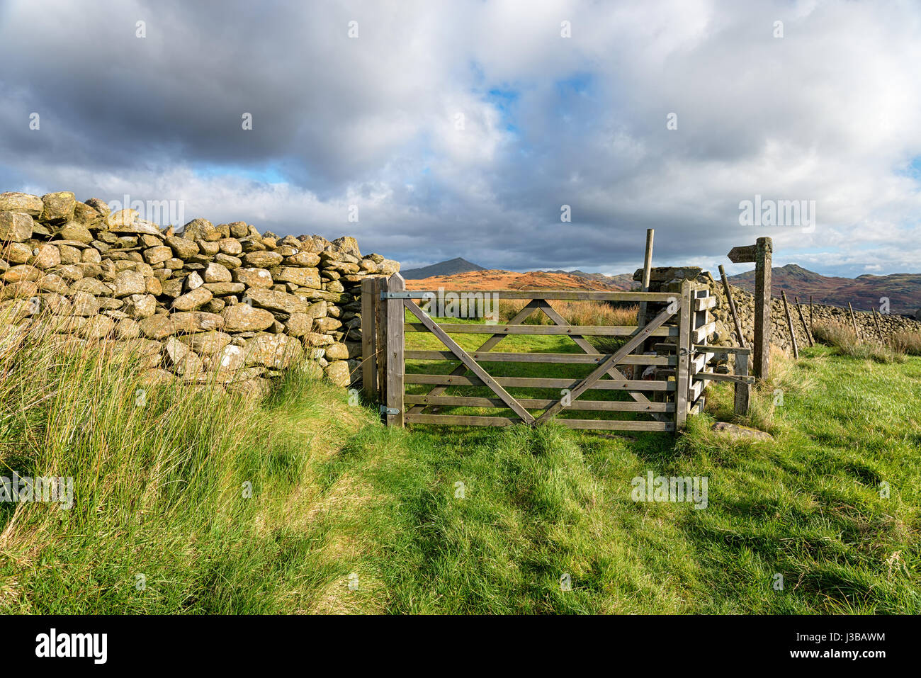 Dramatic skies over Grimecrag near Ulpha in the Lake District National ...