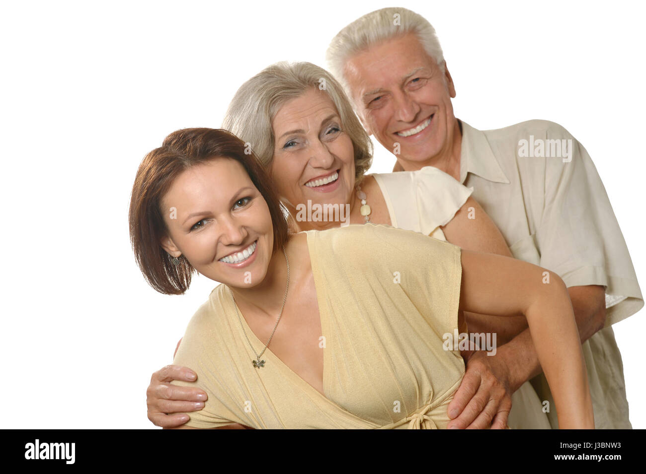 Elderly parents and their adult daughter Stock Photo - Alamy