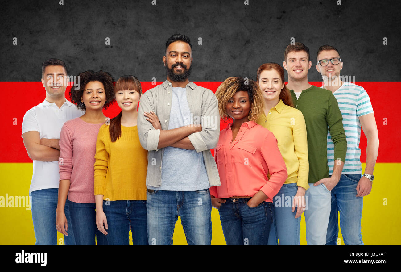 international group of people over german flag Stock Photo - Alamy