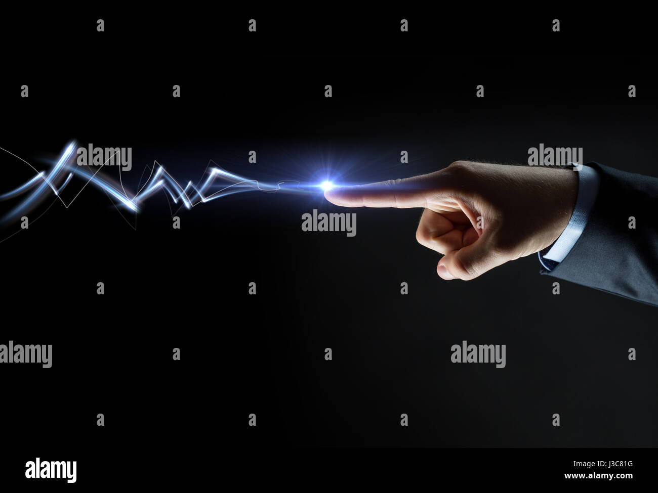 businessman finger connecting to lightning Stock Photo - Alamy