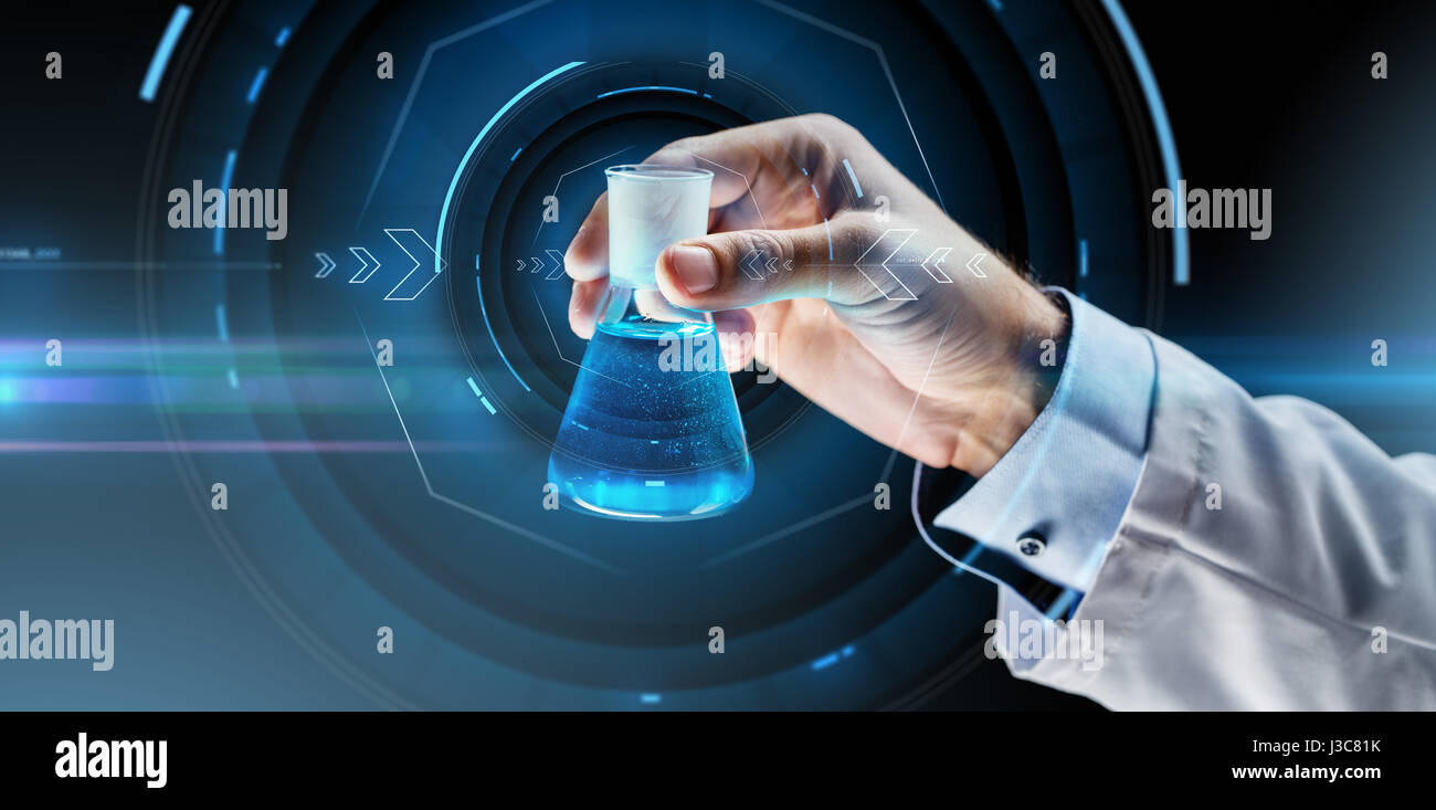 close up of scientist holding flask with chemical Stock Photo - Alamy