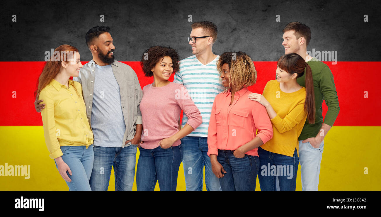 international group of people over german flag Stock Photo - Alamy