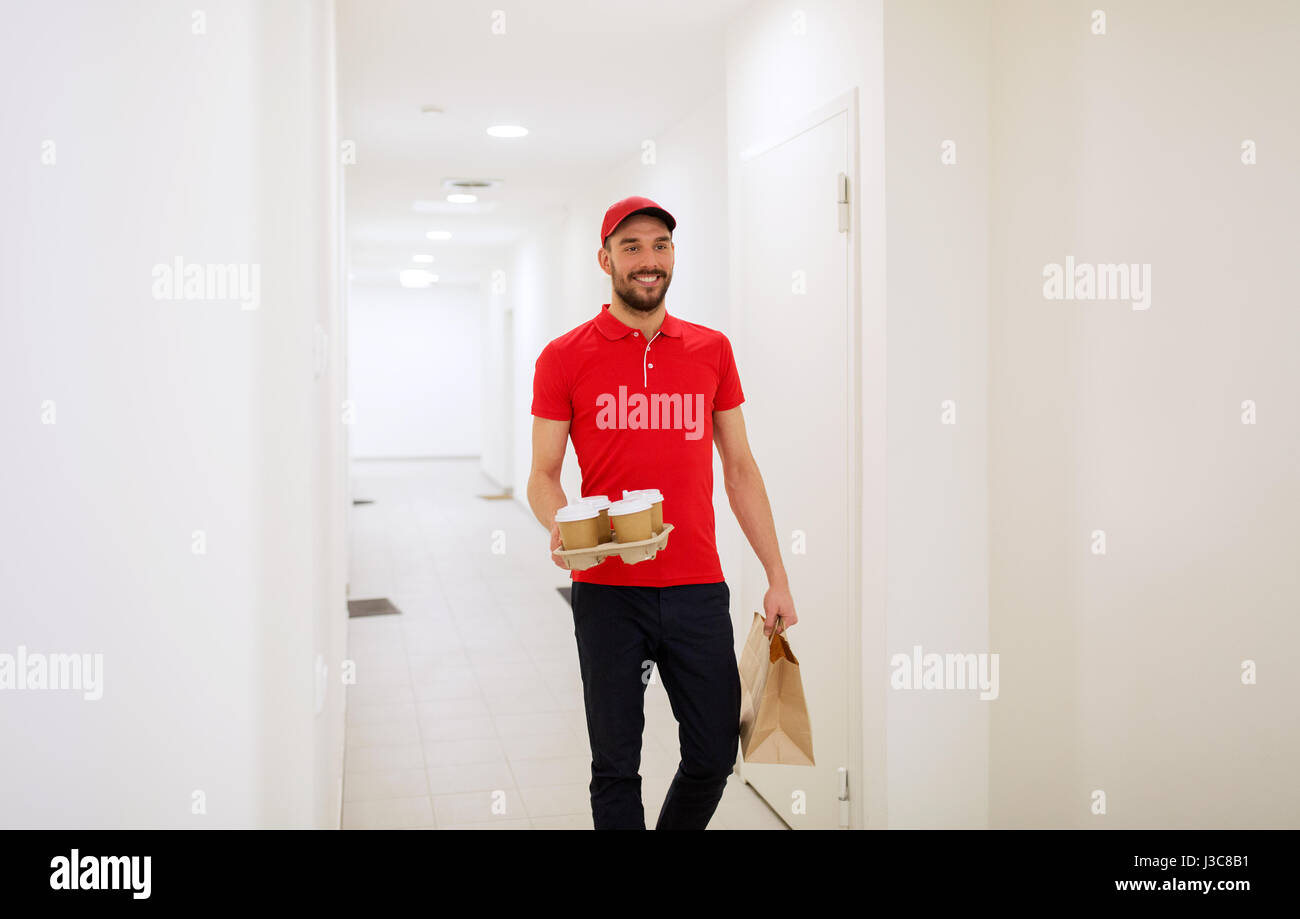 man delivering coffee and food to customer home Stock Photo - Alamy