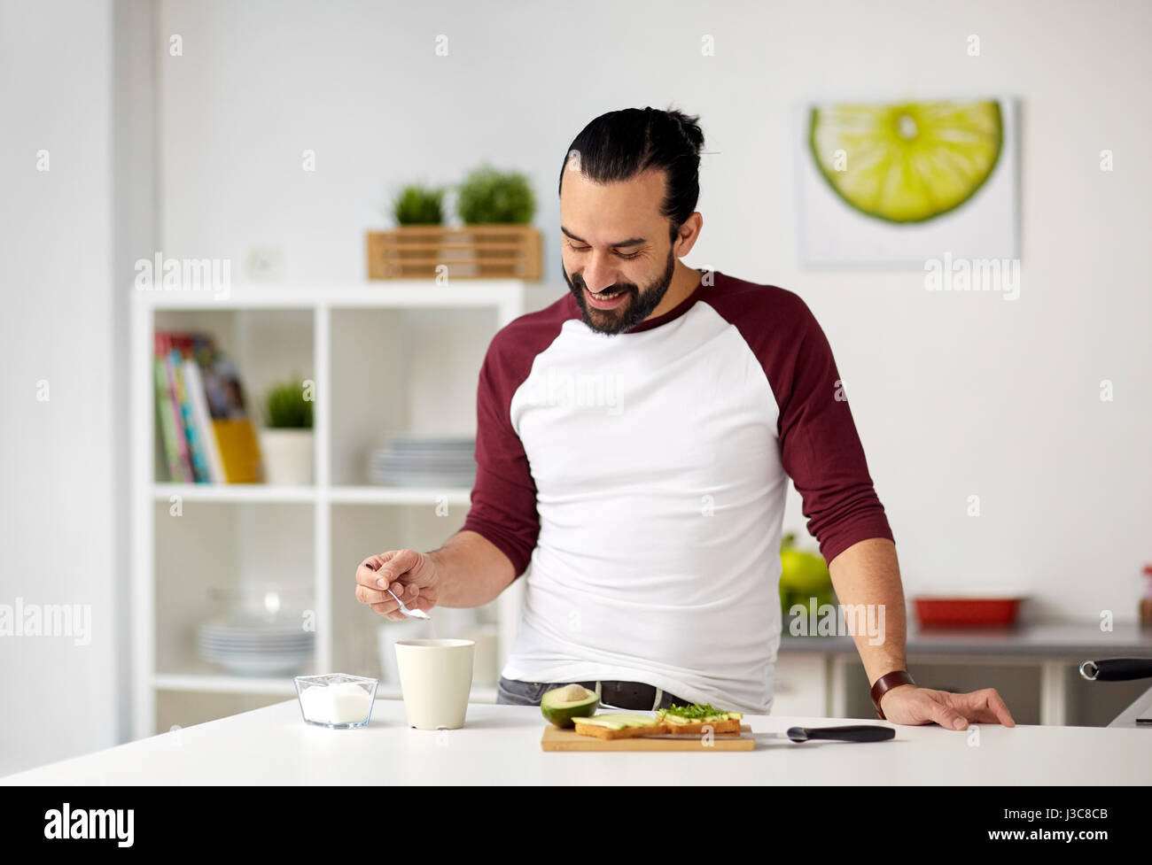 Man eating sugar hi-res stock photography and images - Alamy