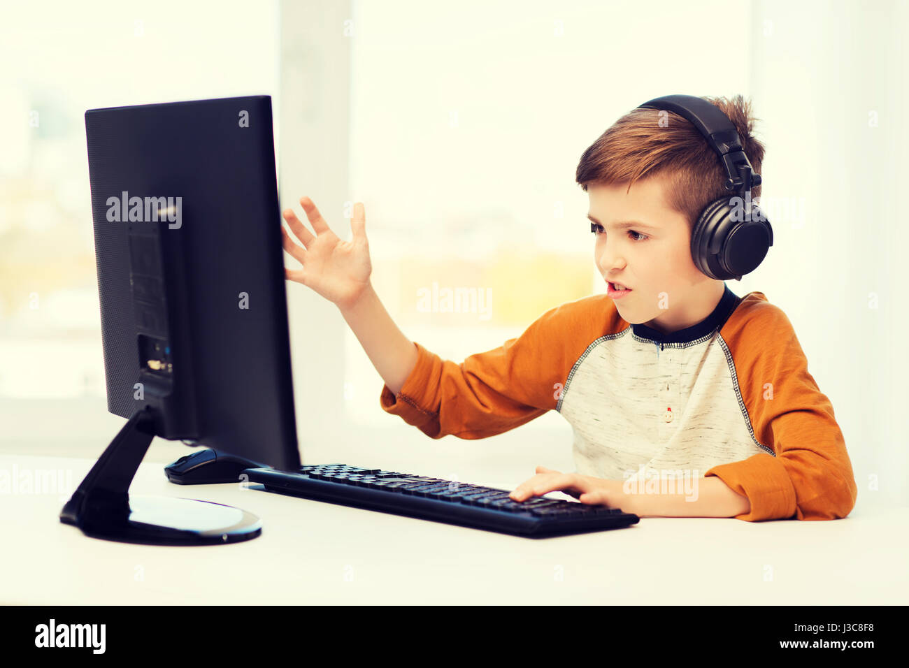 Kid Angry At Computer