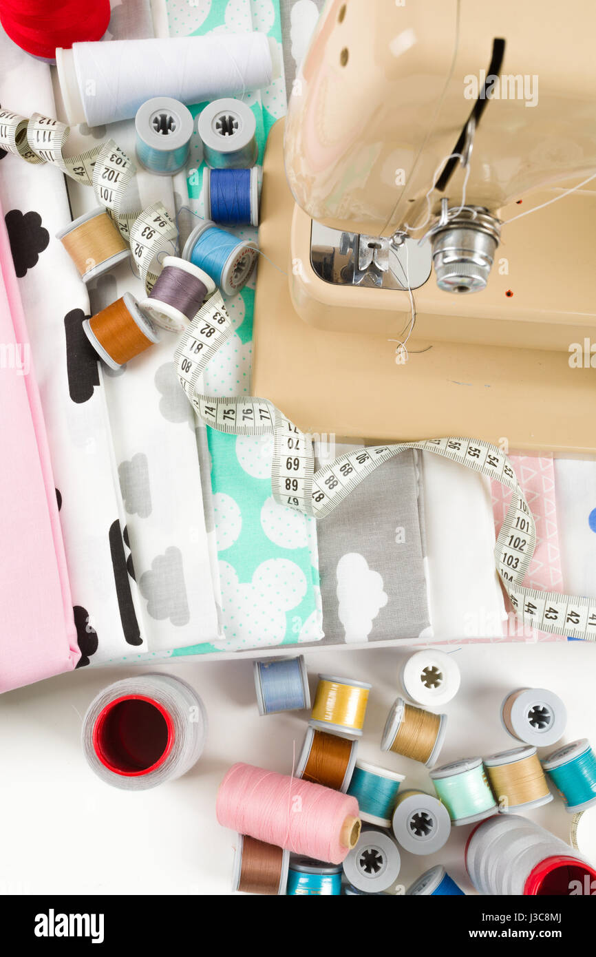 detail of Sewing machine, cotton cotton fabric and tailor measurement ...