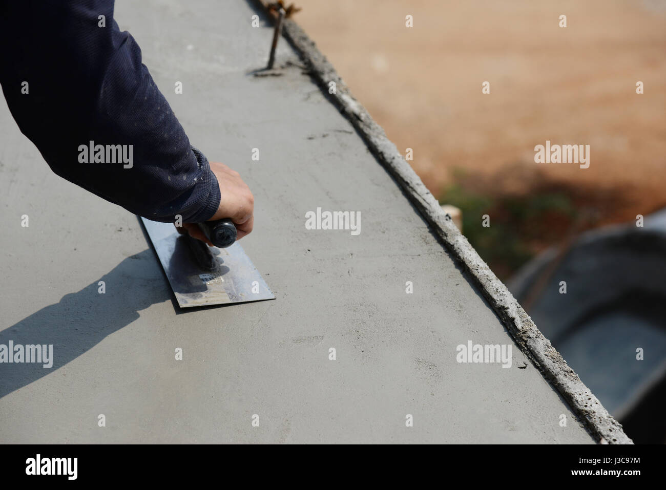 Worker's Hand Plasterer at work. Application of the plaster on the ...