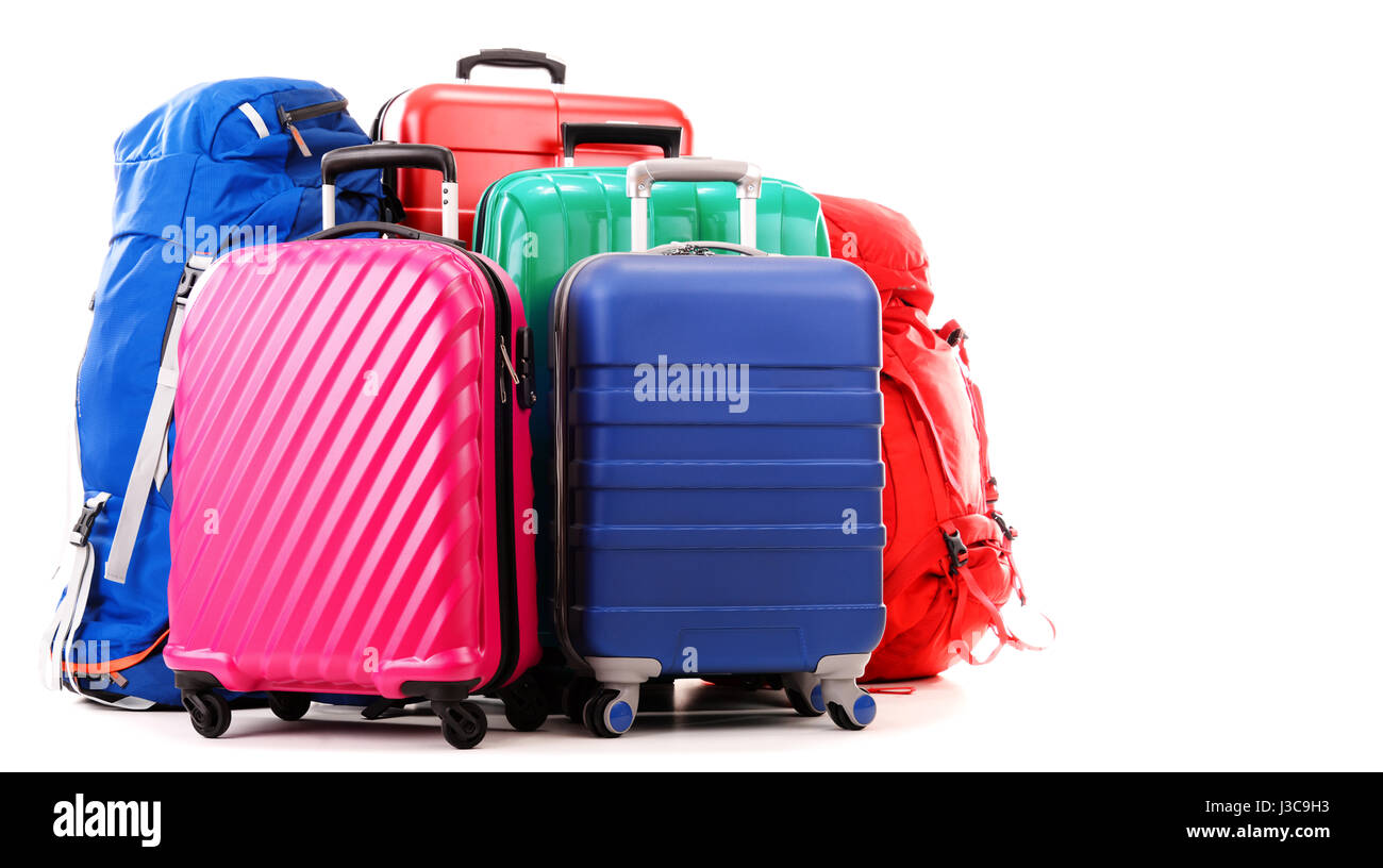 Luggage consisting of large suitcases and rucksacks isolated on white ...