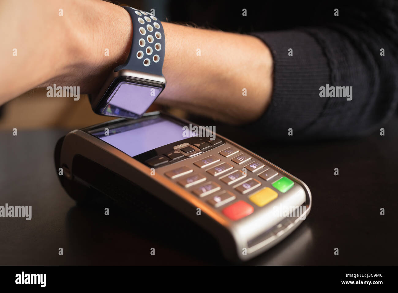 Contactless payment using smartwatch hi-res stock photography and ...