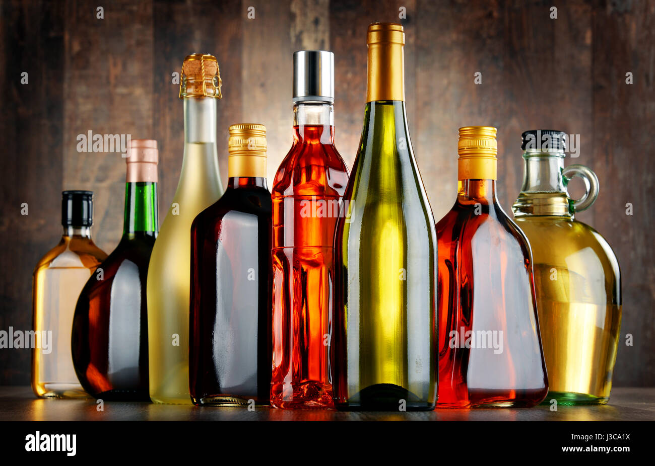 Bottles of assorted alcoholic beverages Stock Photo - Alamy