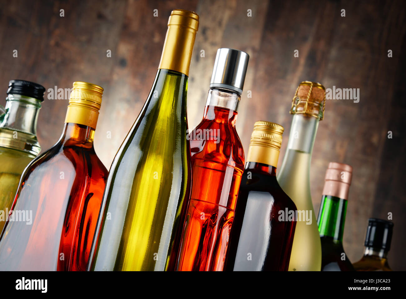 Bottles of assorted alcoholic beverages Stock Photo - Alamy