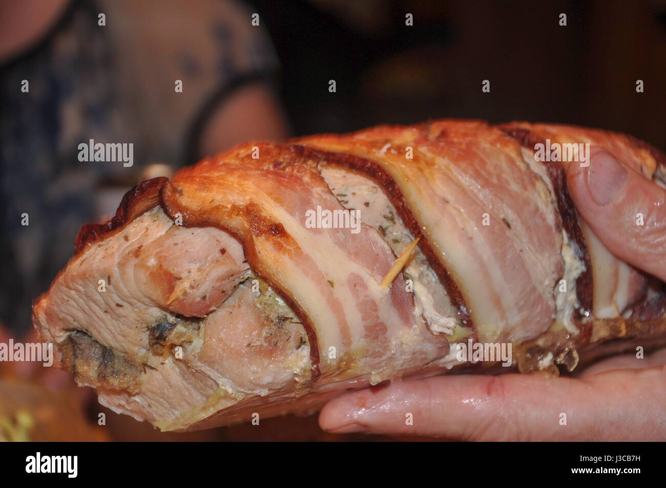 traditional roasted polish ham witt bacon and stuffing Stock Photo - Alamy