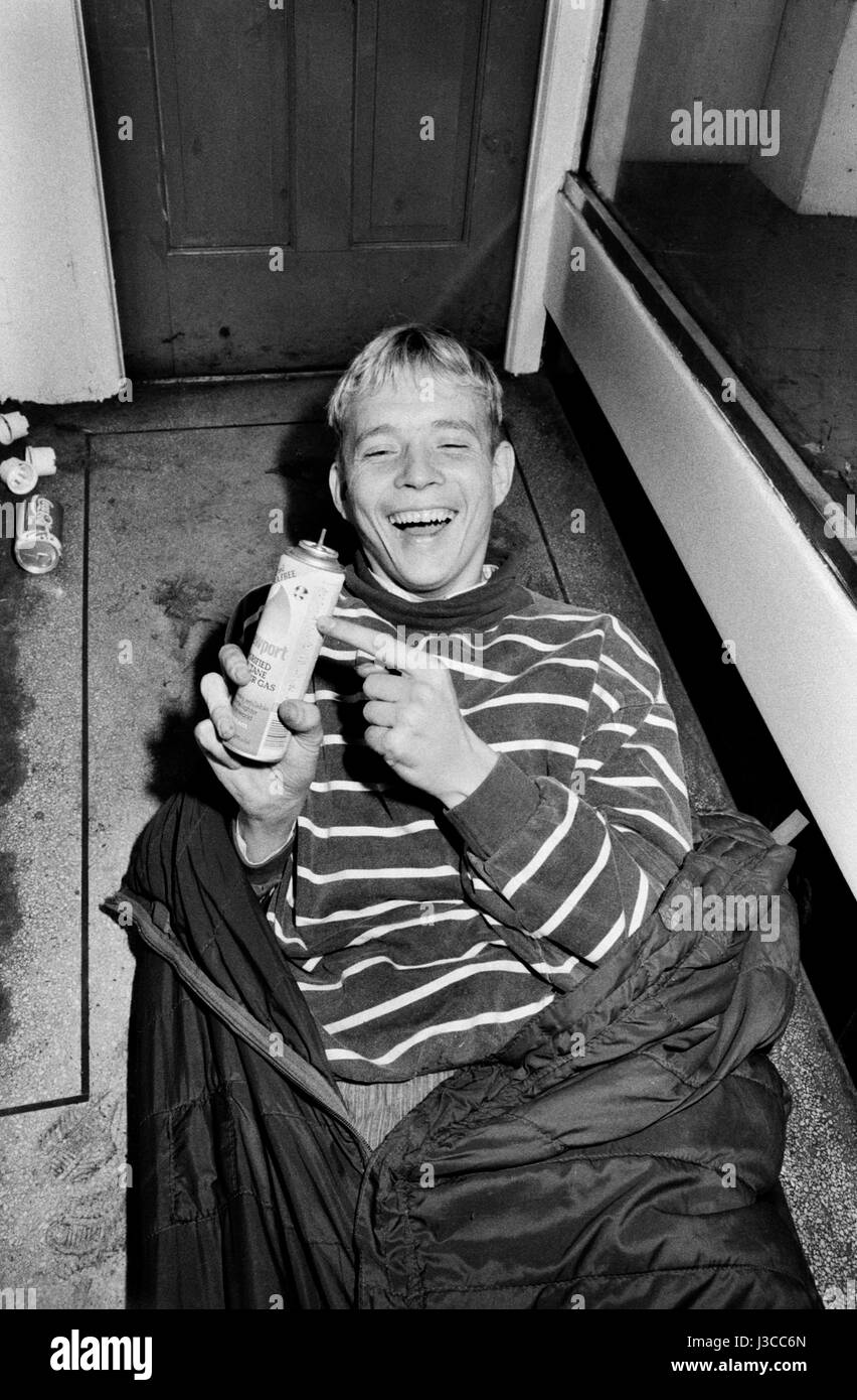 Drugs UK 1980s. Teen boy young adult using Laughing Gas from a ...