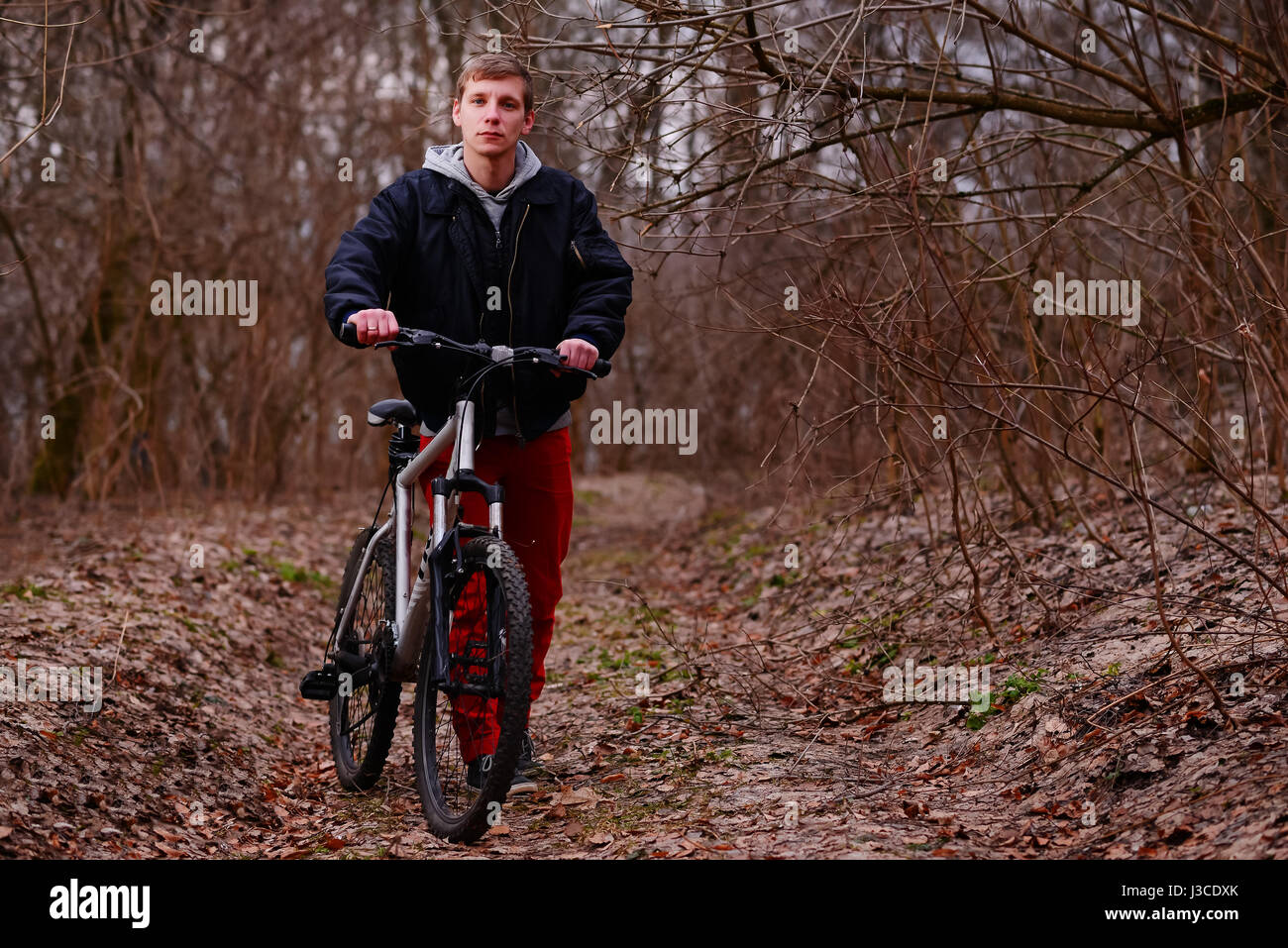 Biker riding bicycle sunset along hi-res stock photography and images ...
