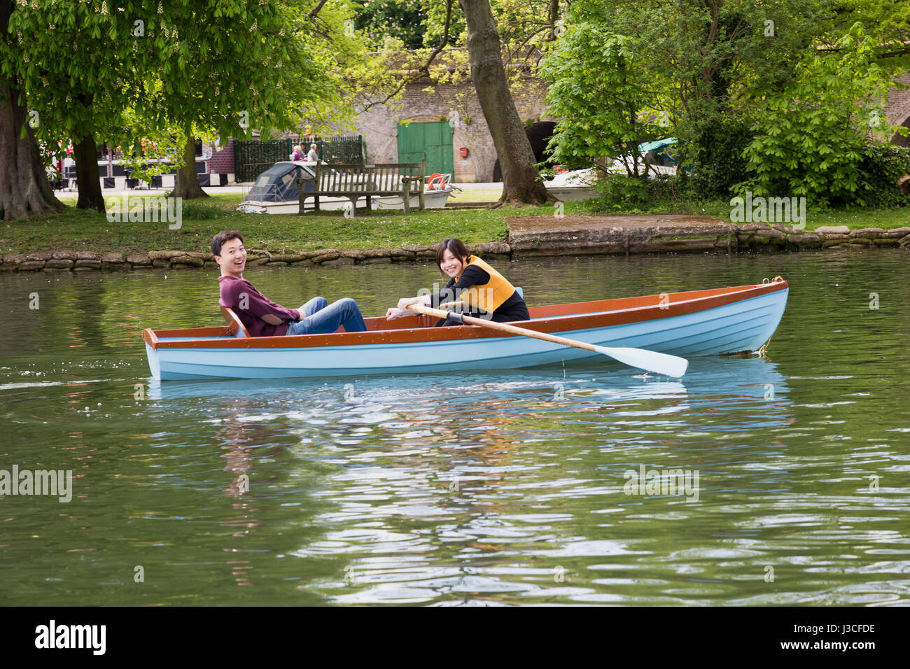 Lady rowing pleasure rowing boat hi-res stock photography and images ...