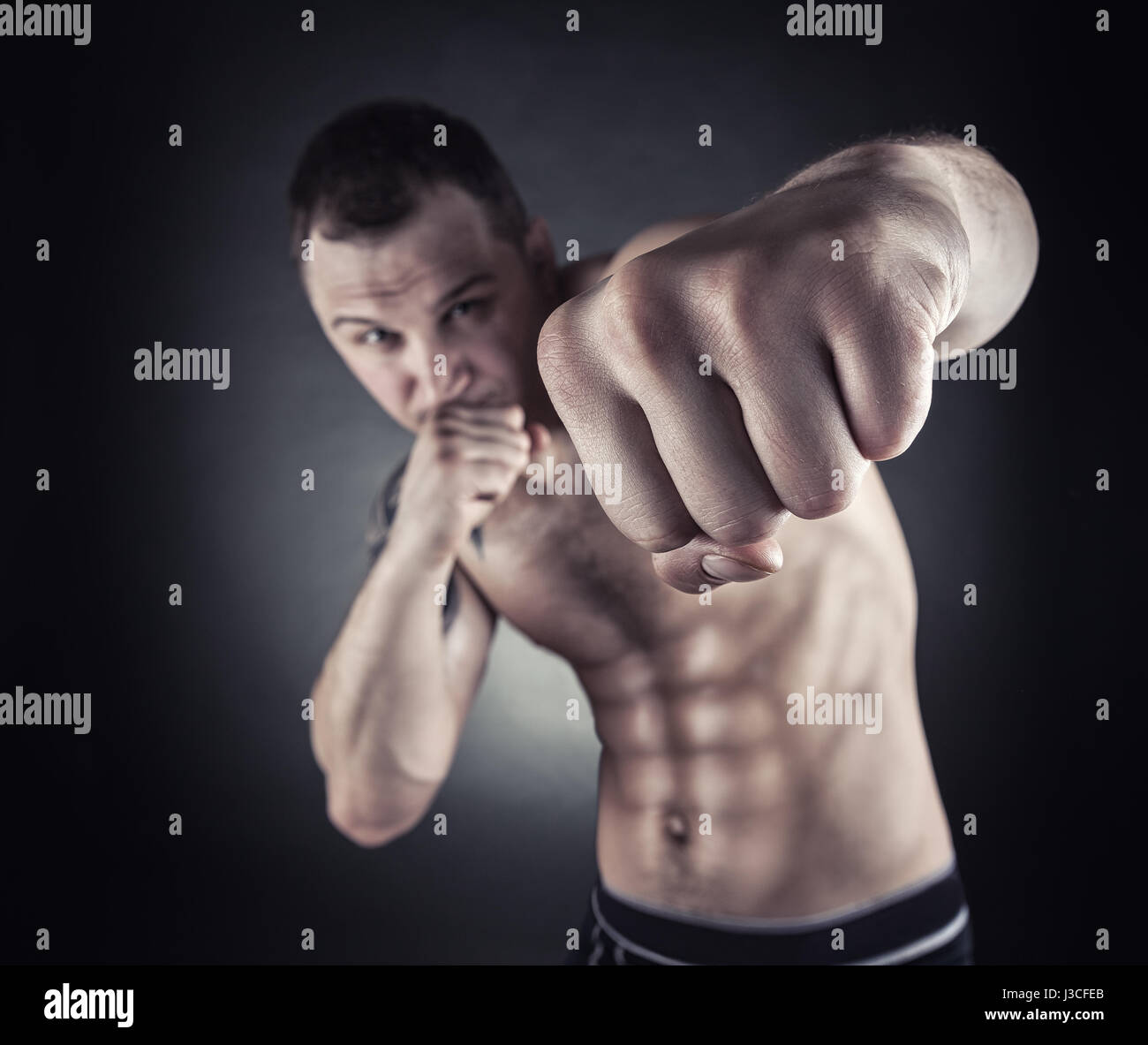 Boxing concept. Closeup boxer fist. Focus on the hand Stock Photo - Alamy