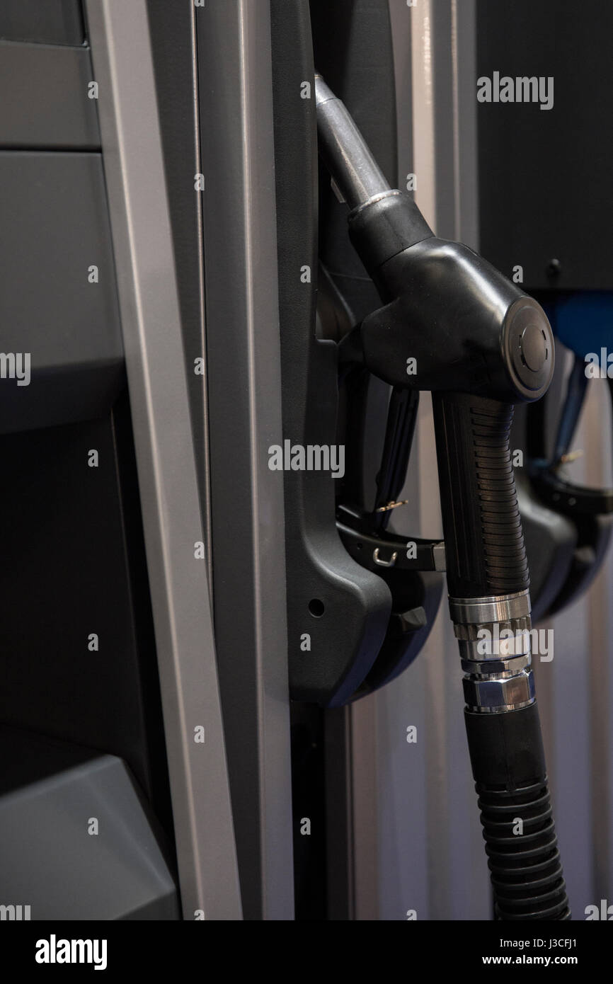 Closeup of the fuel pistol on the petrol station Stock Photo - Alamy
