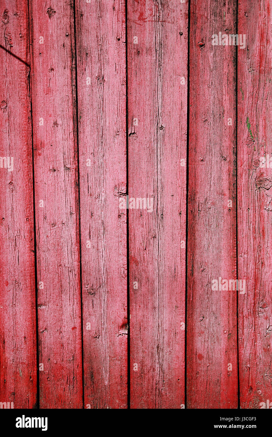 A fragment of an old, painted, red wooden surface Stock Photo - Alamy