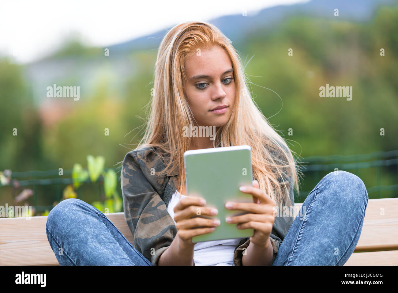 young woman seeing shocking or embarrassing things on the internet ...