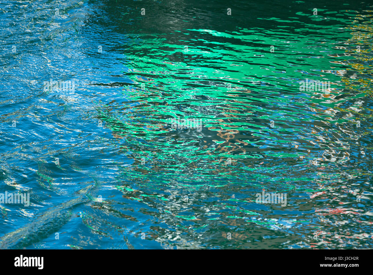 Abstract reflection pattern on a clear water surface Stock Photo - Alamy