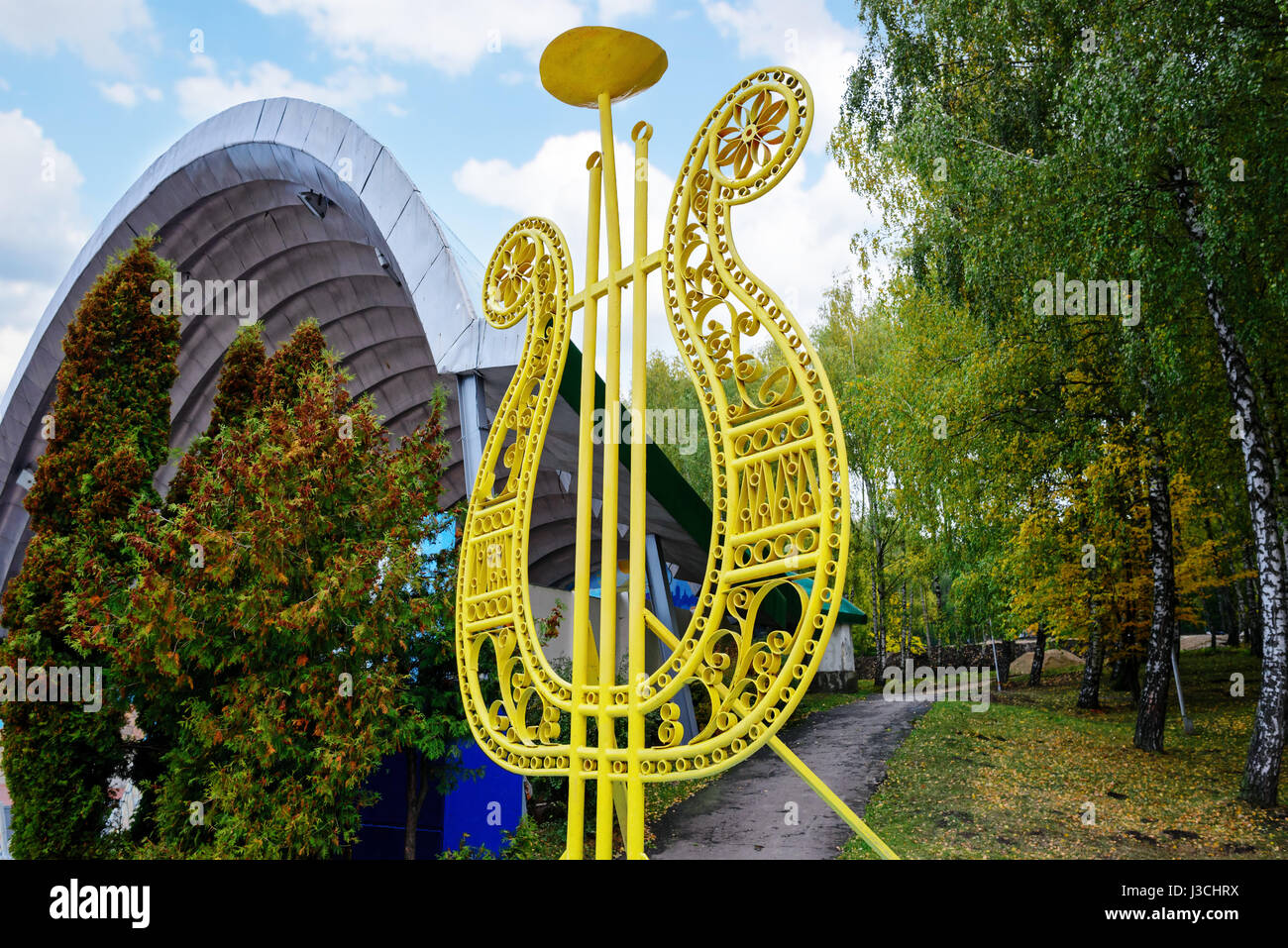 Musical Symbol lira installed in the park Stock Photo - Alamy