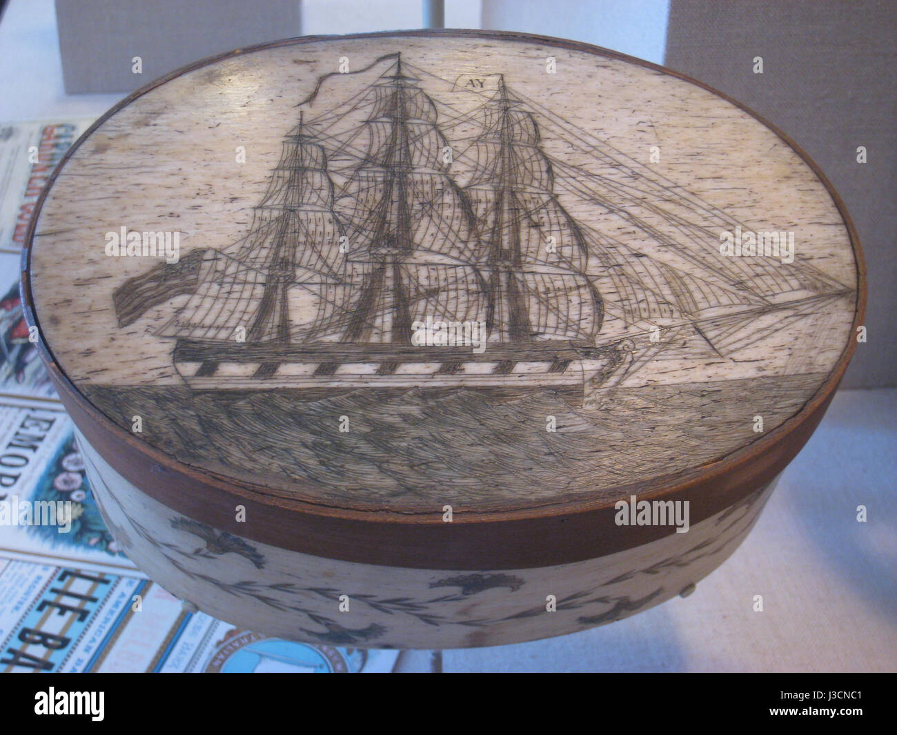 A 19th-century ditty box, decorated with scrimshaw, is displayed at the ...