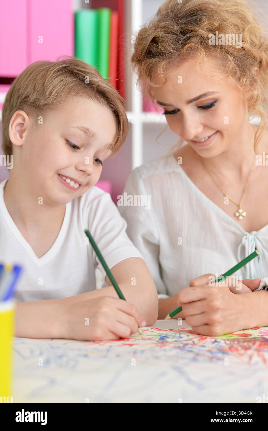 Mom and son doing lessons Stock Photo - Alamy