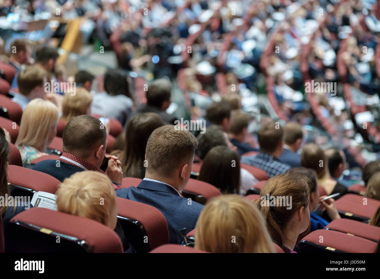 Audience at conference hall Stock Photo - Alamy