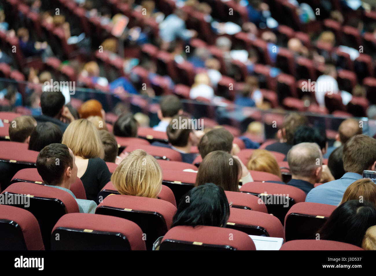 Audience at conference hall Stock Photo - Alamy