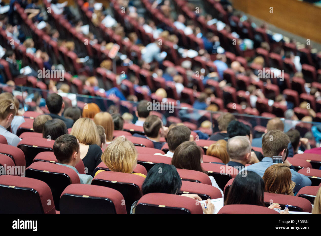 Audience at conference hall Stock Photo - Alamy